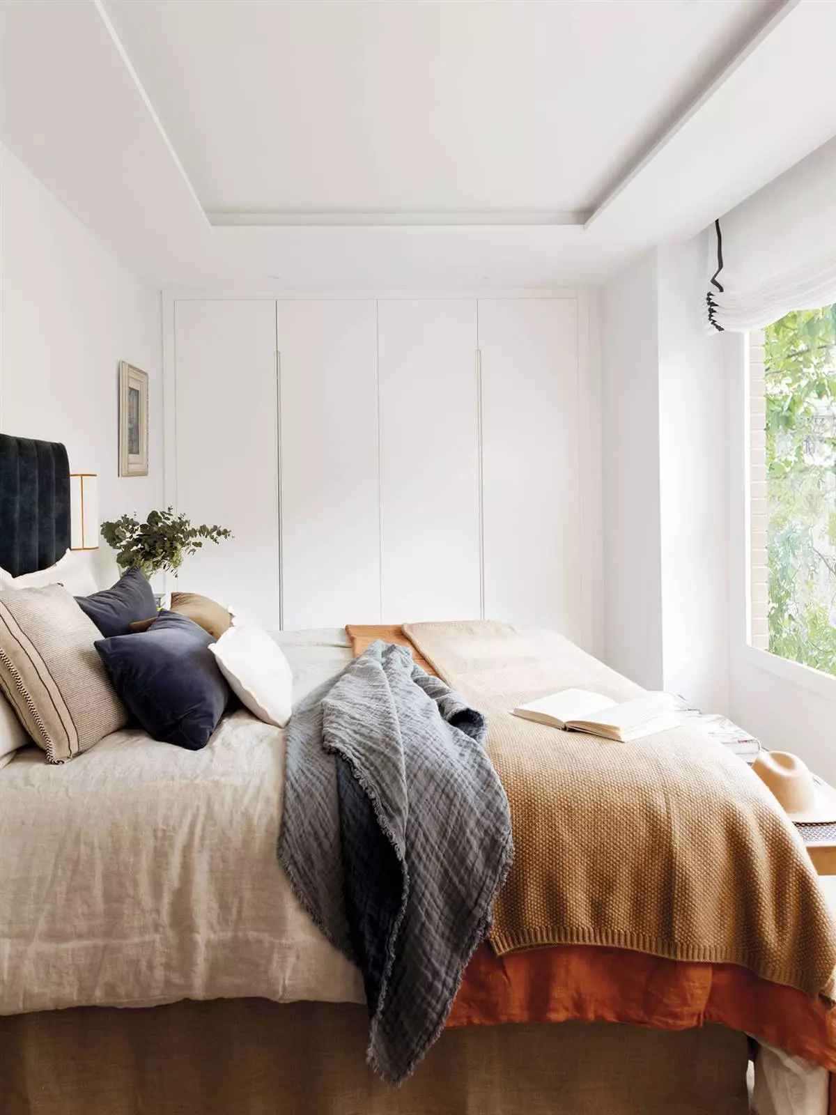 A stylish bedroom in blue velvet