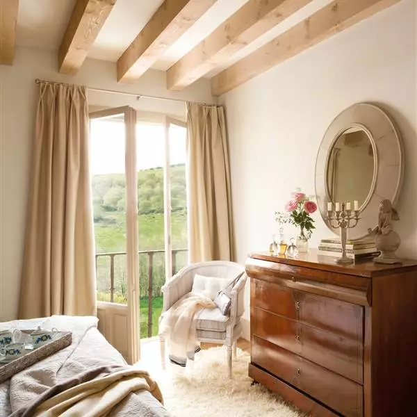 Antique chest of drawers in a bedroom