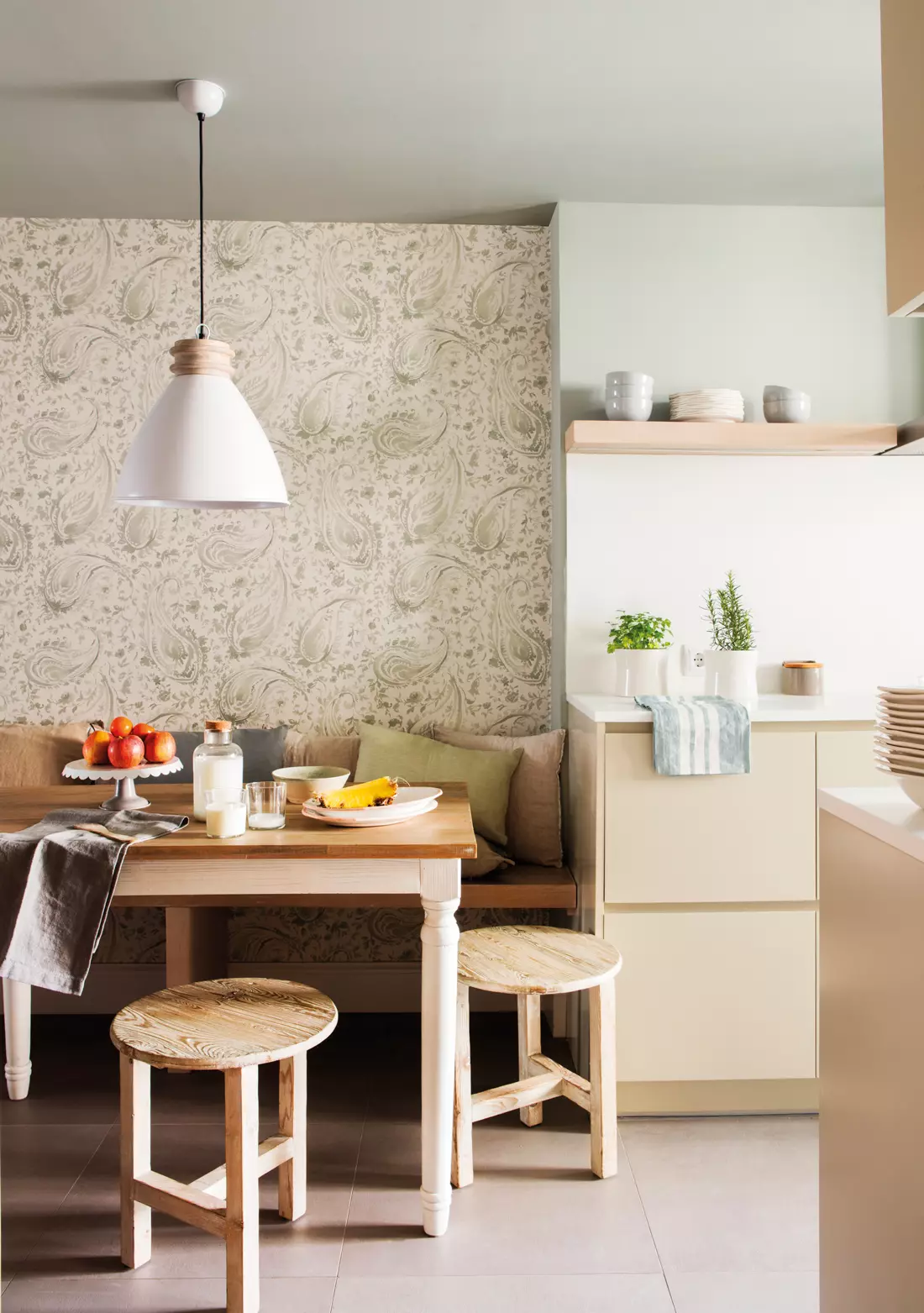 Kitchen with small office with wallpaper