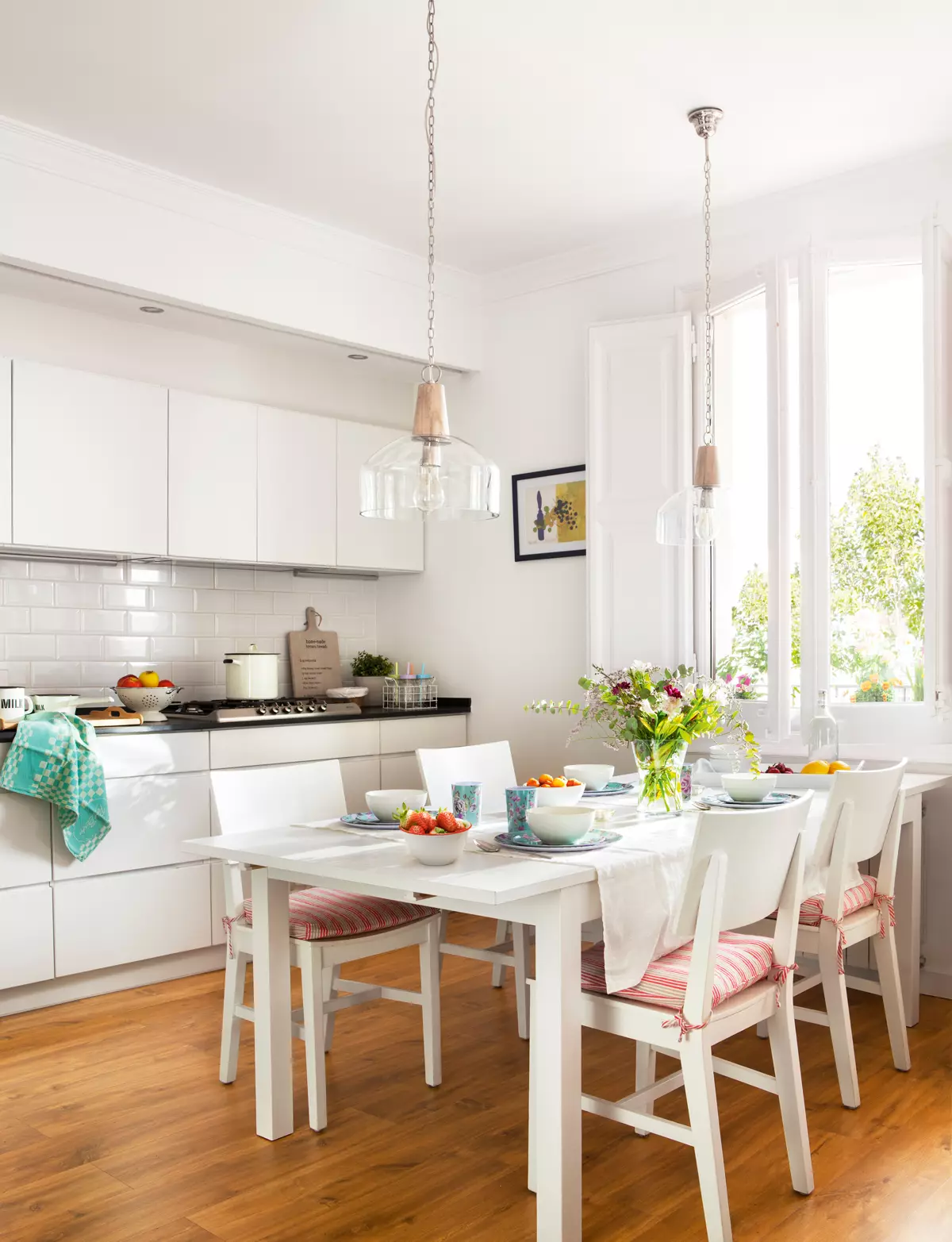 White kitchen with office with white table