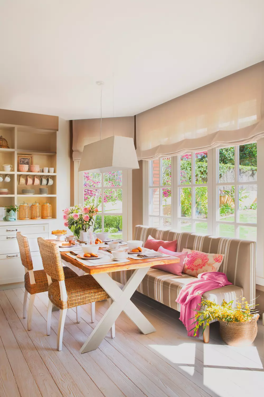 Kitchen with office with upholstered bench and pantry