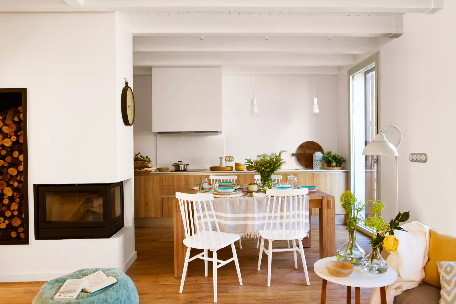 Living room with fireplace and office that separates from the kitchen