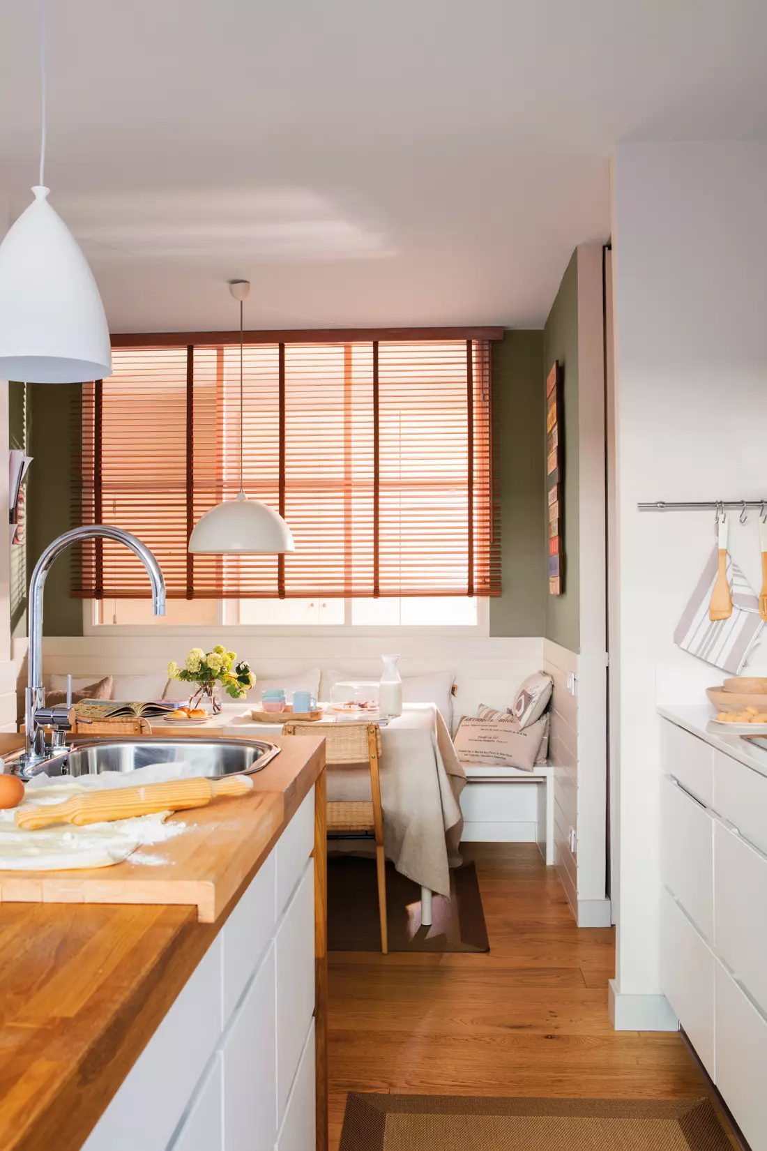 Kitchen with office with bench under the window