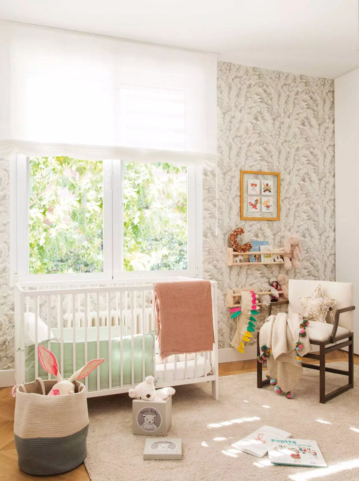 Baby's bedroom with crib, wallpaper, rug and toys 501850