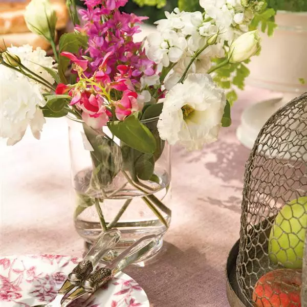 Detail of a vase with flowers on a table