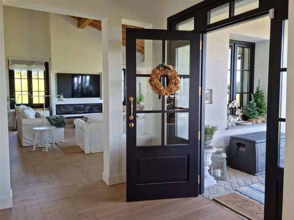 Entrance and living room of the house of the reader Paloma Blanc in Asturias