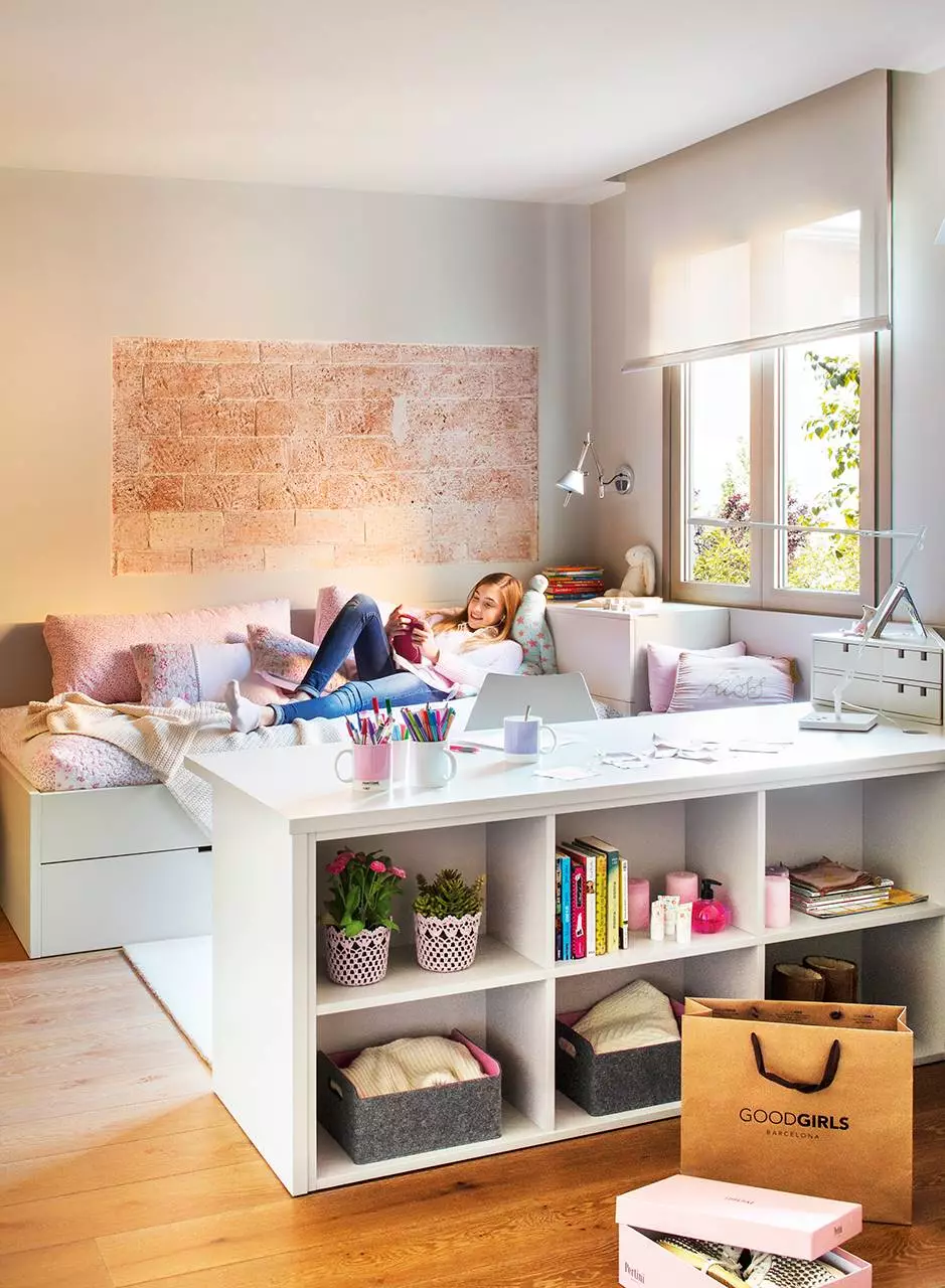 Youth bedroom with exposed brick on the wall