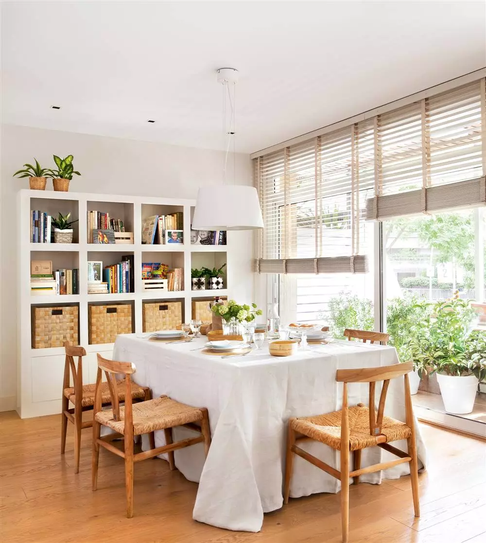 Dining room with square table and bookcase_ 00411159