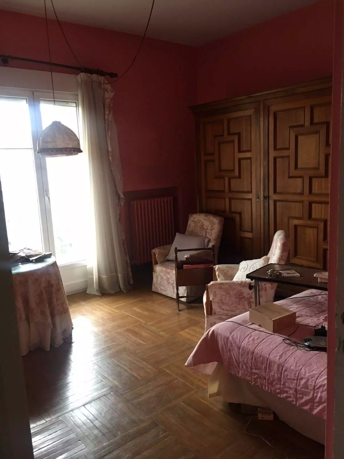 Before the main bedroom of the blue Soldecor apartment in Avilés