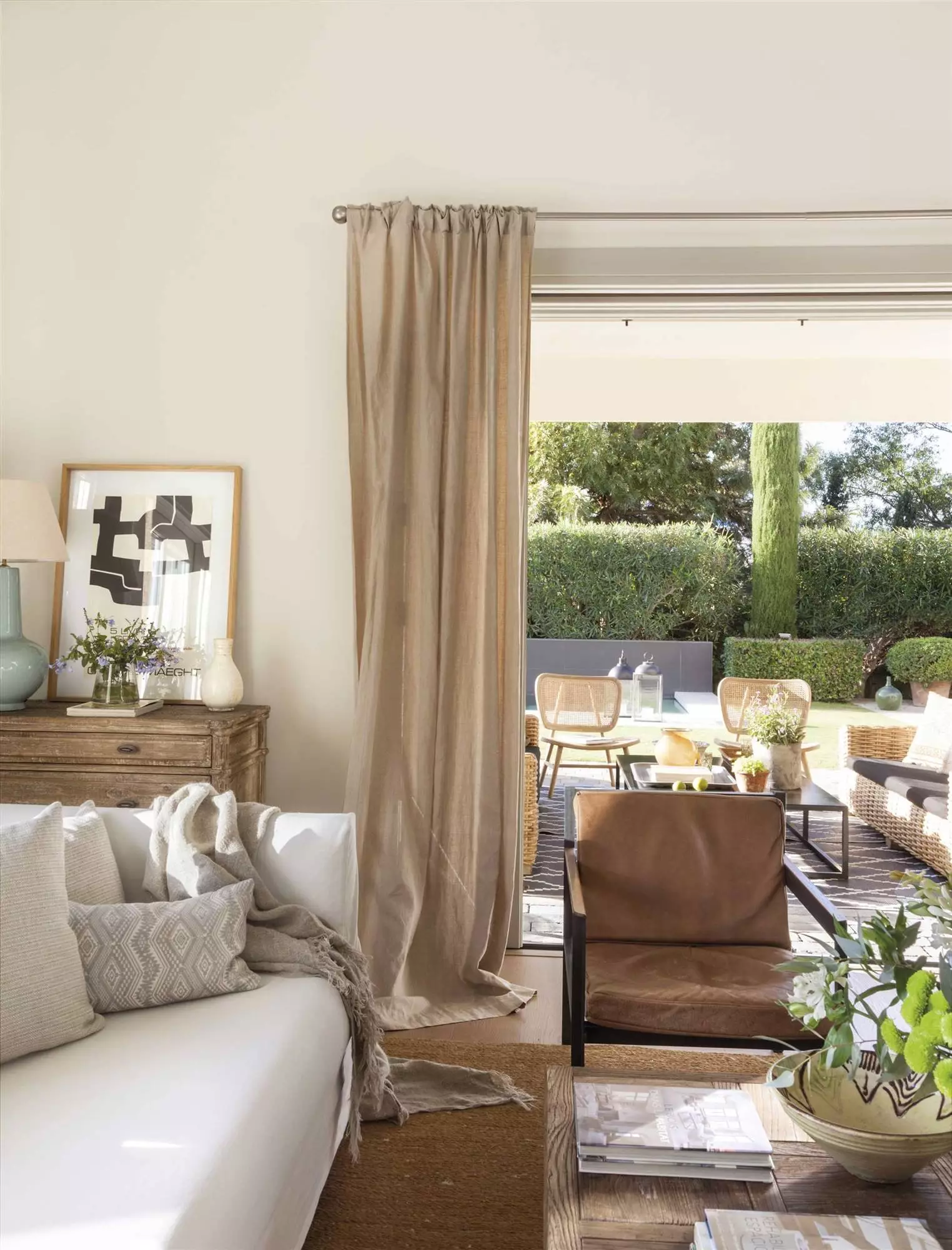 living-room-with-exterior-views-and-beige-curtains-00531824