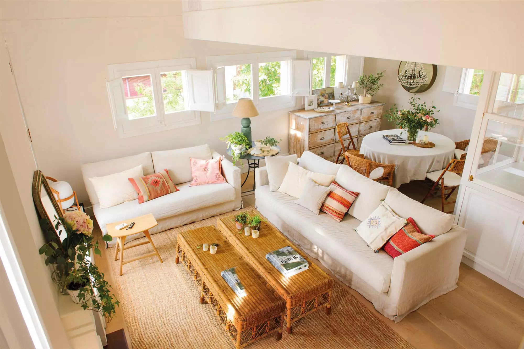 Aerial view of white dining room ine white sofa