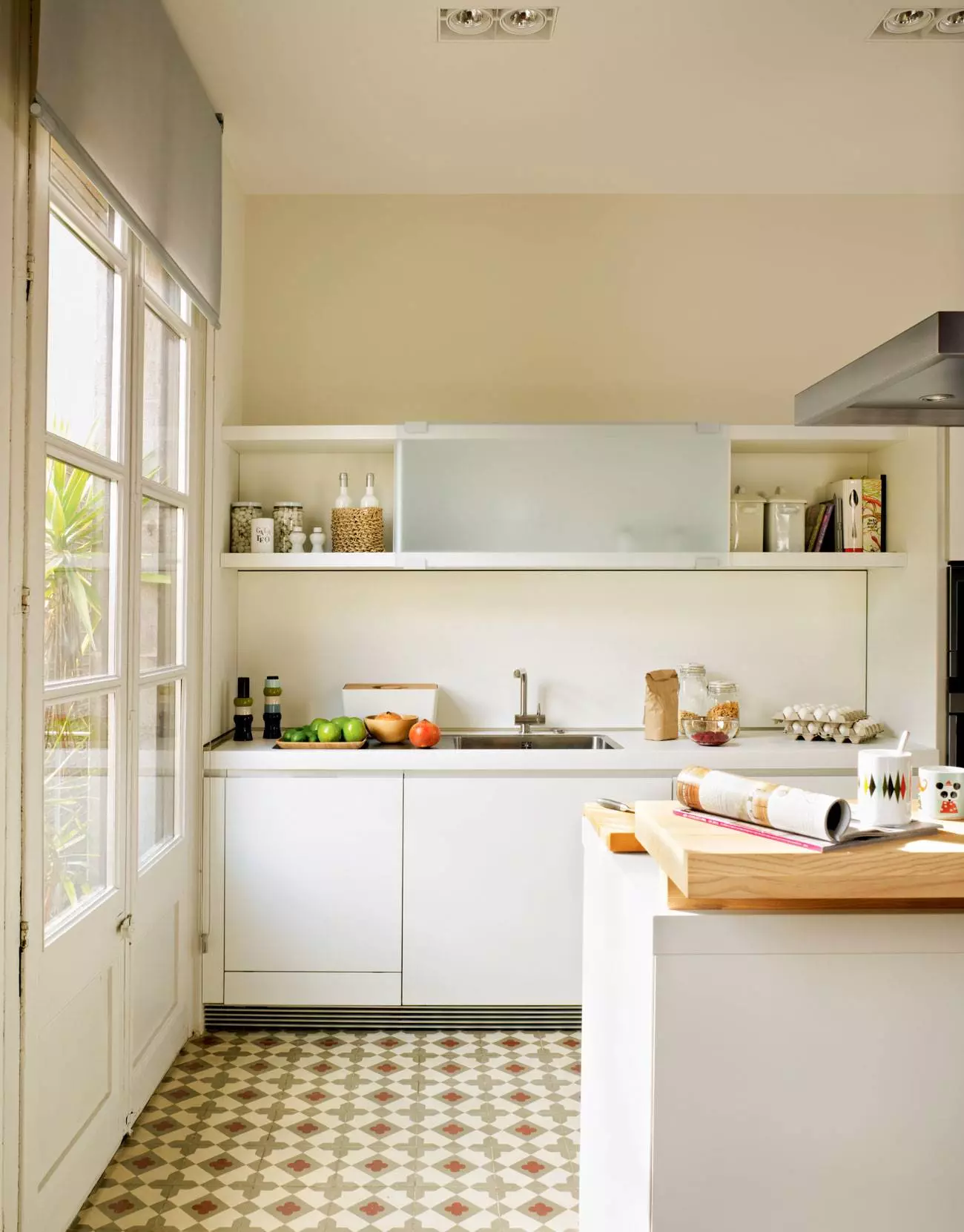 white-kitchen-with-mosaic-floor-and-natural-light 337216