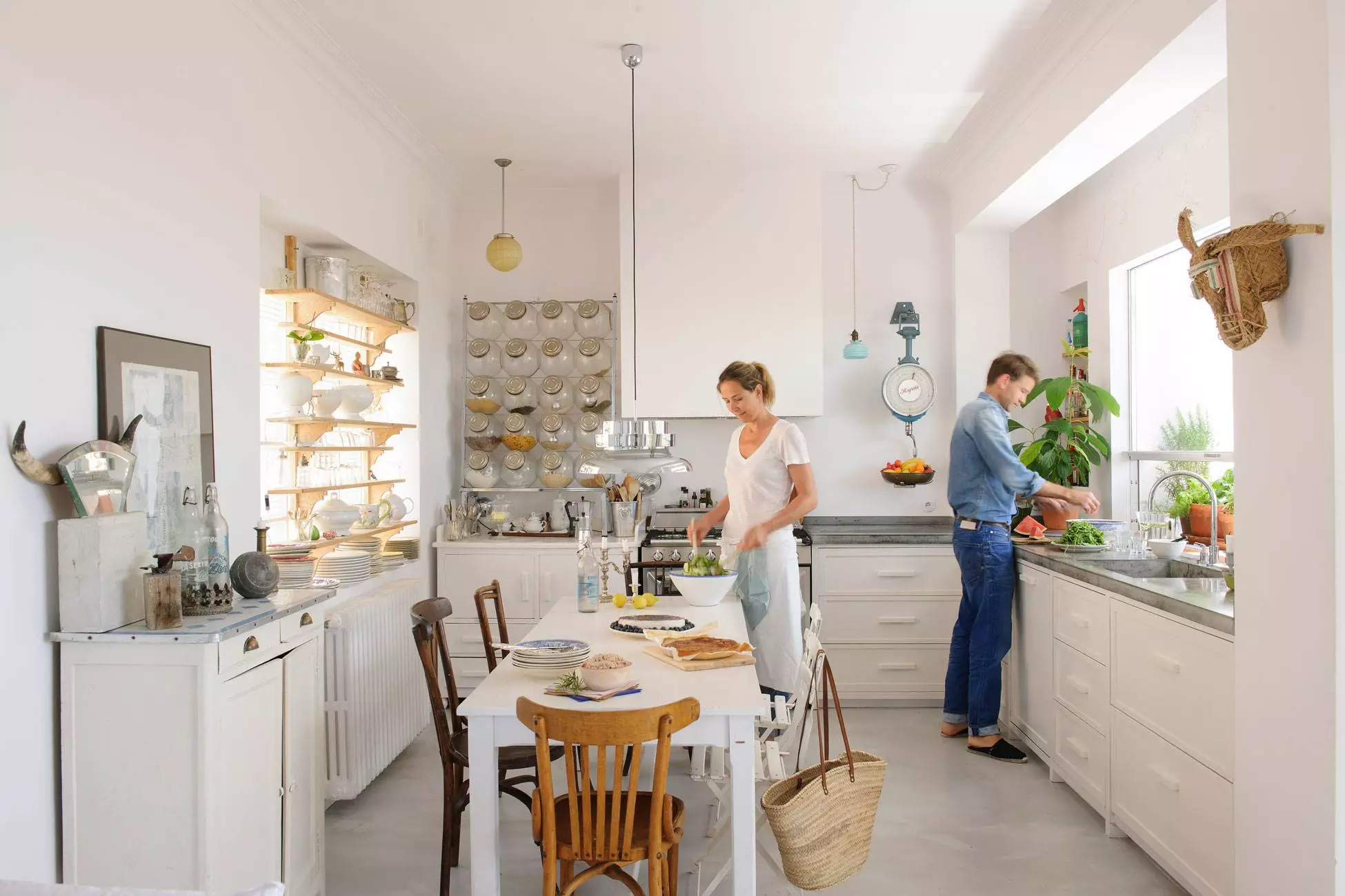 kitchen-in-white-and-cement-floor-with-vintage-decorative-elements 486870 O